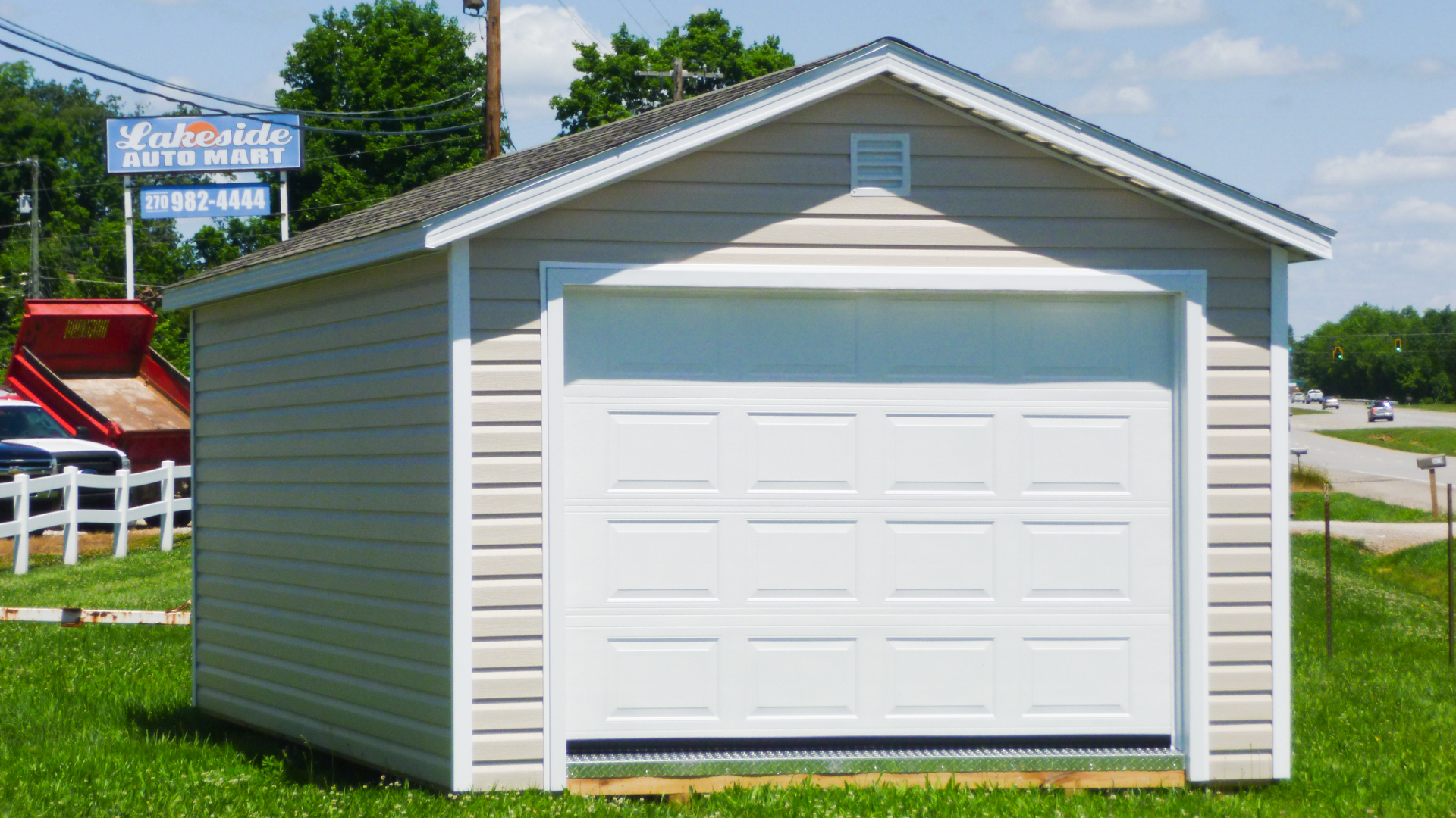exterior of tan and white prefab detached garage for sale - Esh's ...
