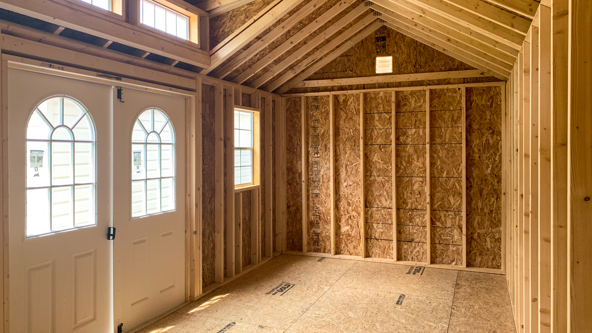 interior of cabin shed with porch for sale at TN and KY - Esh's Utility ...