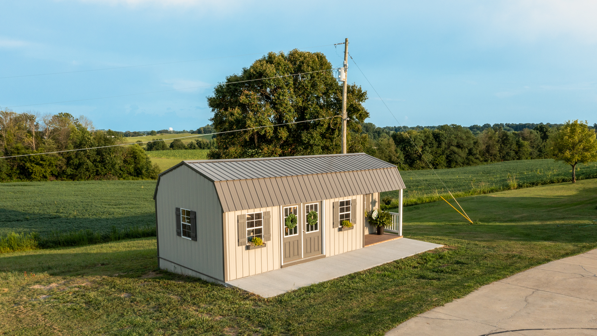 exterior aerial view of shed with porch for sale in KY and TN - Esh's ...