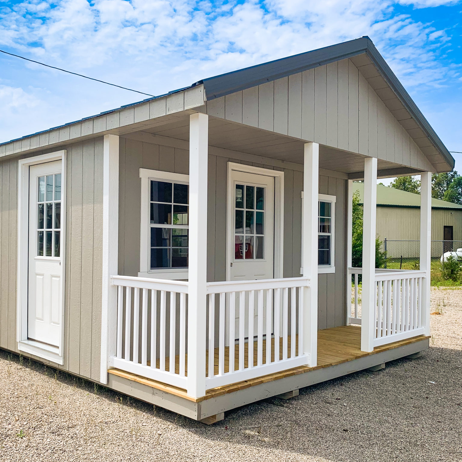 exterior of ranch cabin storage shed with porch for sale - Esh's ...